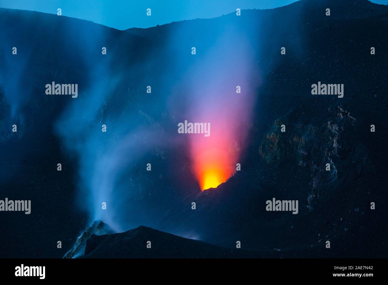 The eruption of active volcano Stromboli spraying lava into the night ...