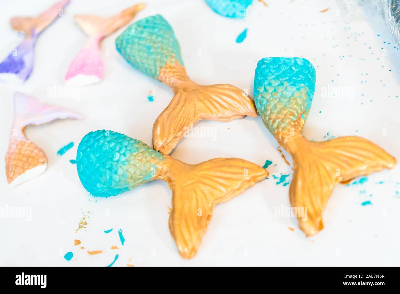 Mermaid tails made out of modeling clay and painted with acrylic paint ...