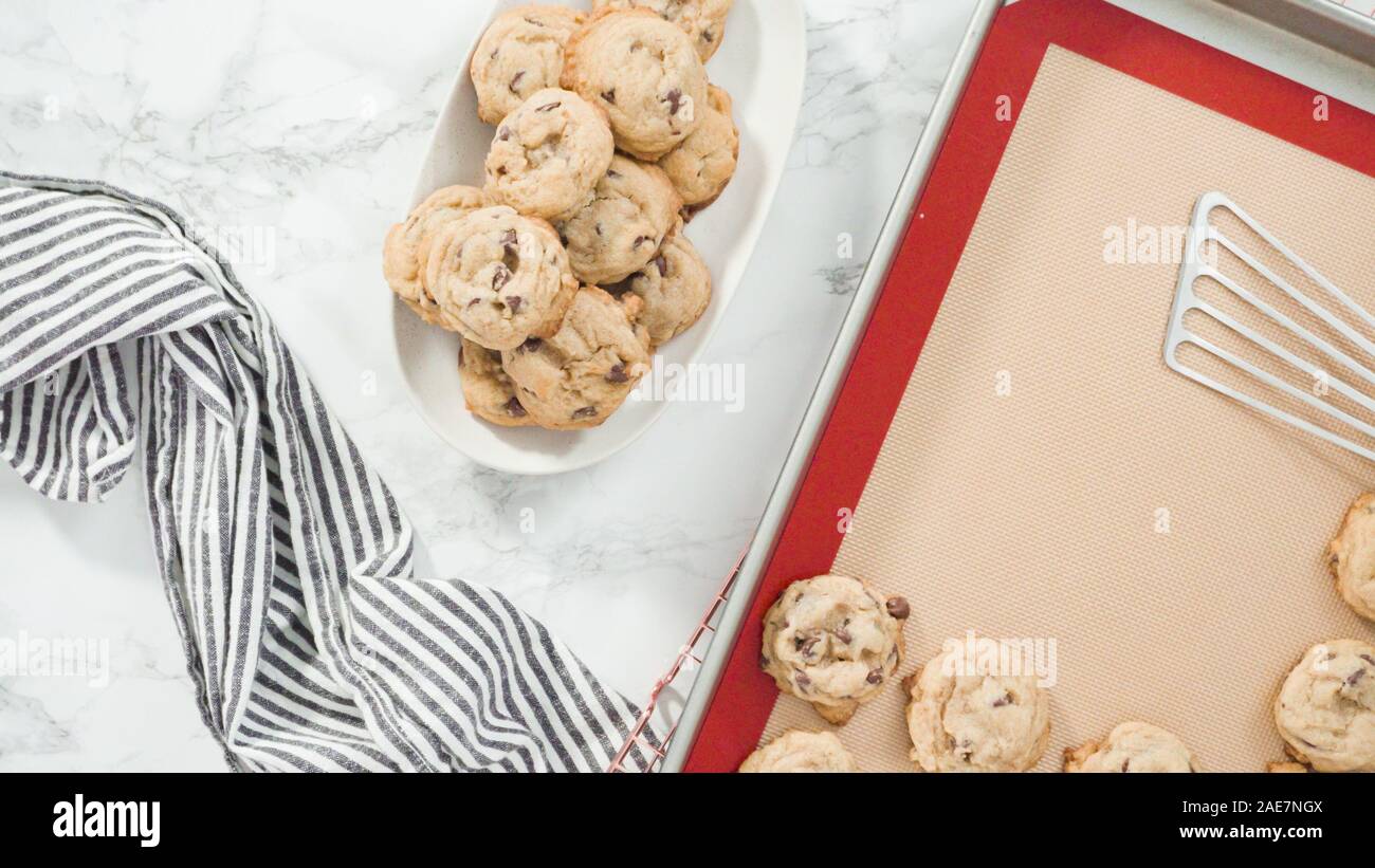 Step by step. Flat lay. Scooping homemade chocolate chip cookies with ...