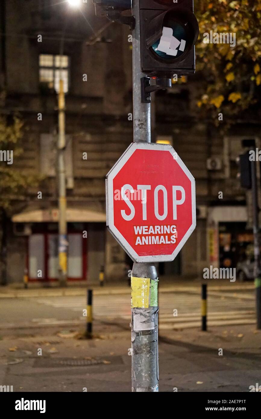 Stop wearing animals traffic sign environment statement Stock Photo - Alamy