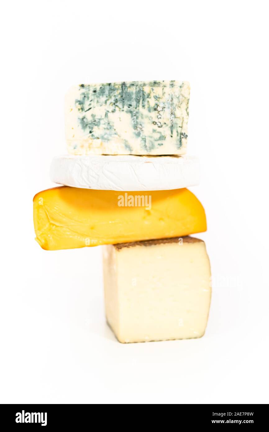 Variety of large wedges gourmet cheese on a white background Stock ...