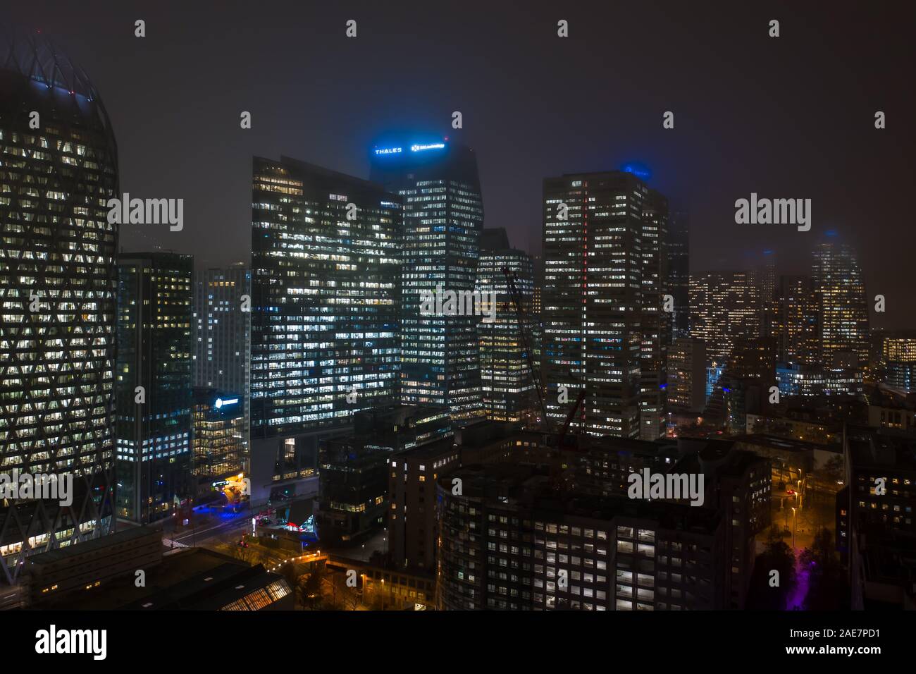 Paris, France - December 5, 2019: Aerial drone night shot of office in ...