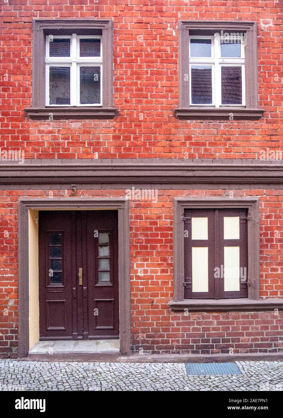 Facade of traditional red brick building in historic Altstadt ...