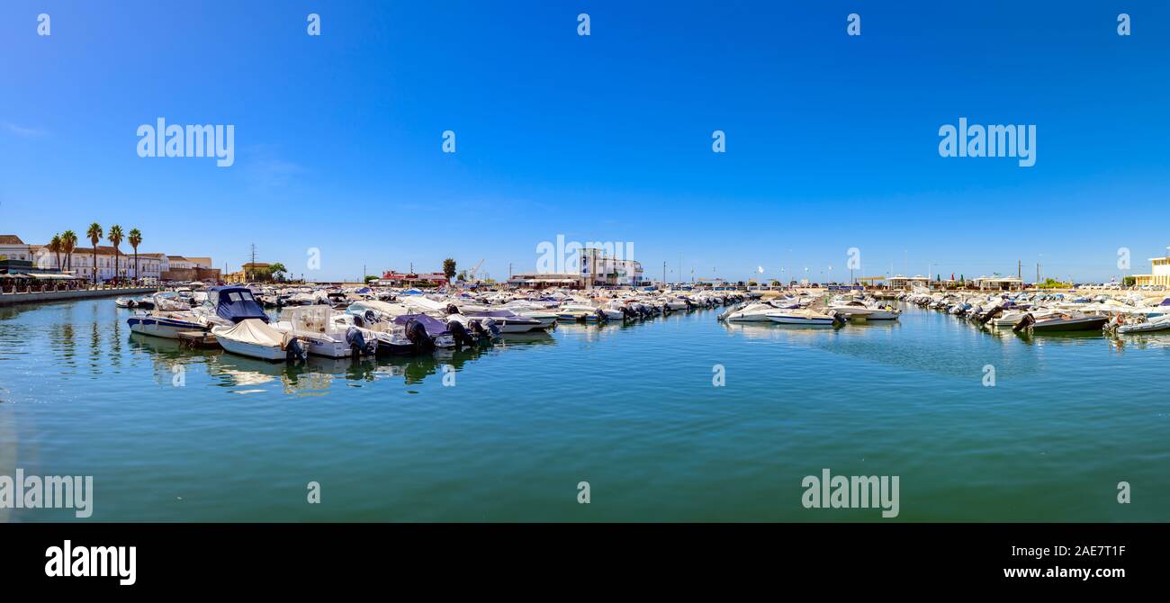Panorama showing Lines of boats and yachts docked at Faro marina ...
