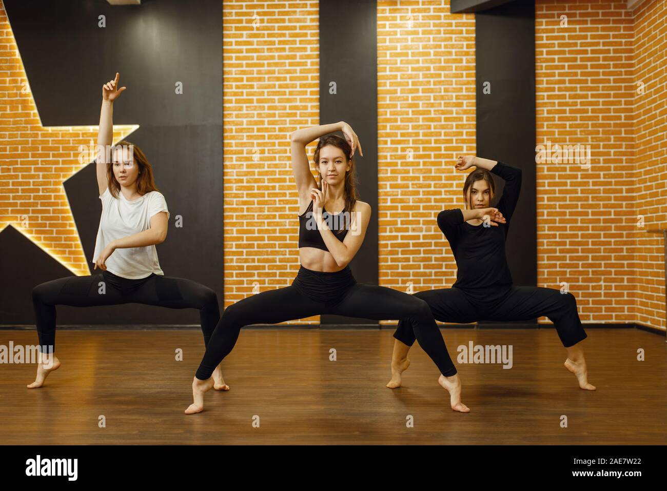 Three contemporary dance performers in studio Stock Photo - Alamy