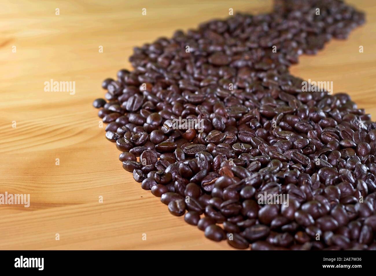 Coffee trial made from roasted coffee beans Stock Photo - Alamy