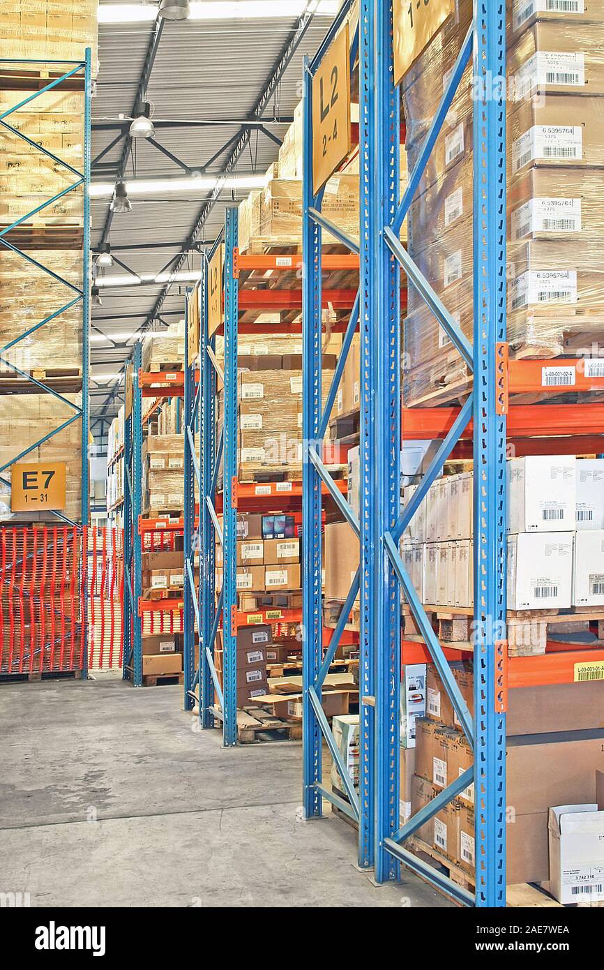 Big warehouse storage room with boxes and shelves Stock Photo - Alamy