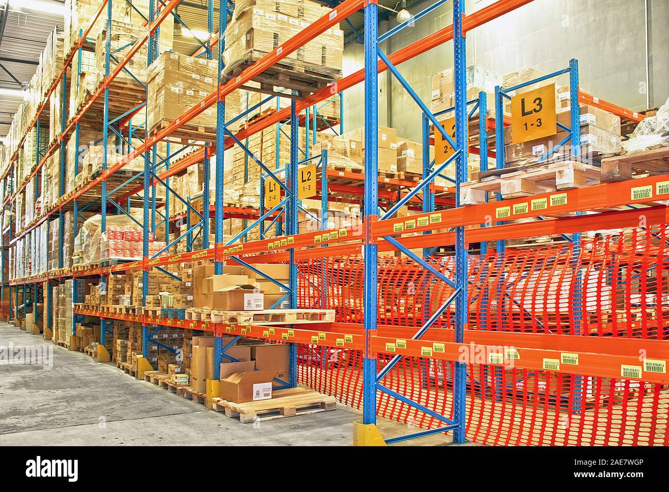 Big warehouse storage room with boxes and shelves Stock Photo - Alamy