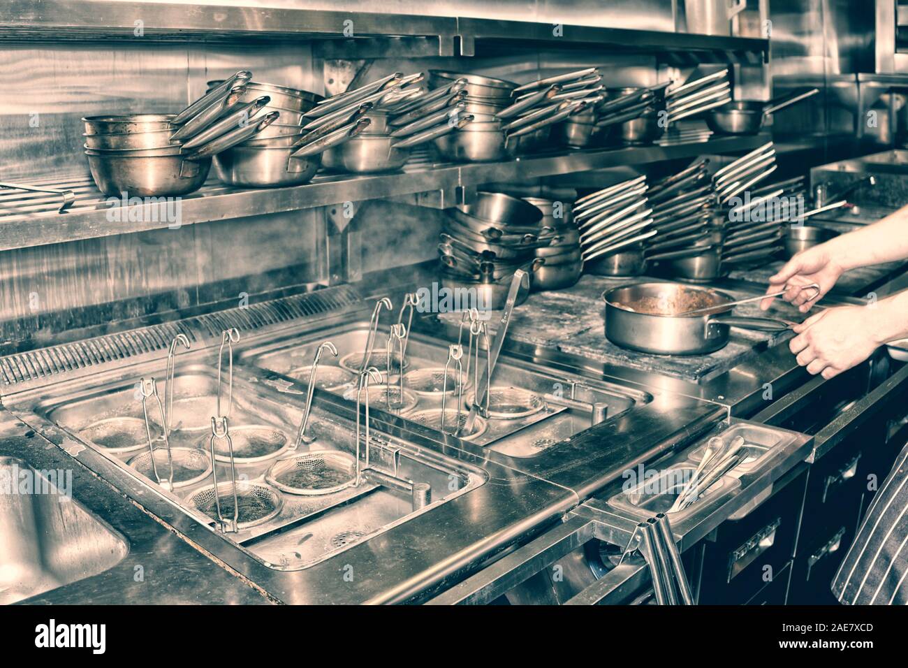 Typical kitchen of a restaurant shot in operation, toned image Stock ...