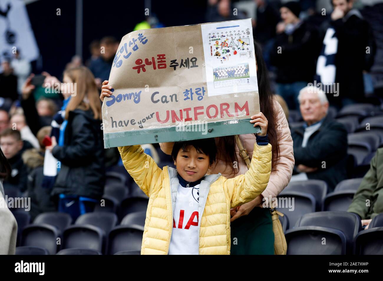 Korean football fan with son heung min banner hi-res stock photography ...