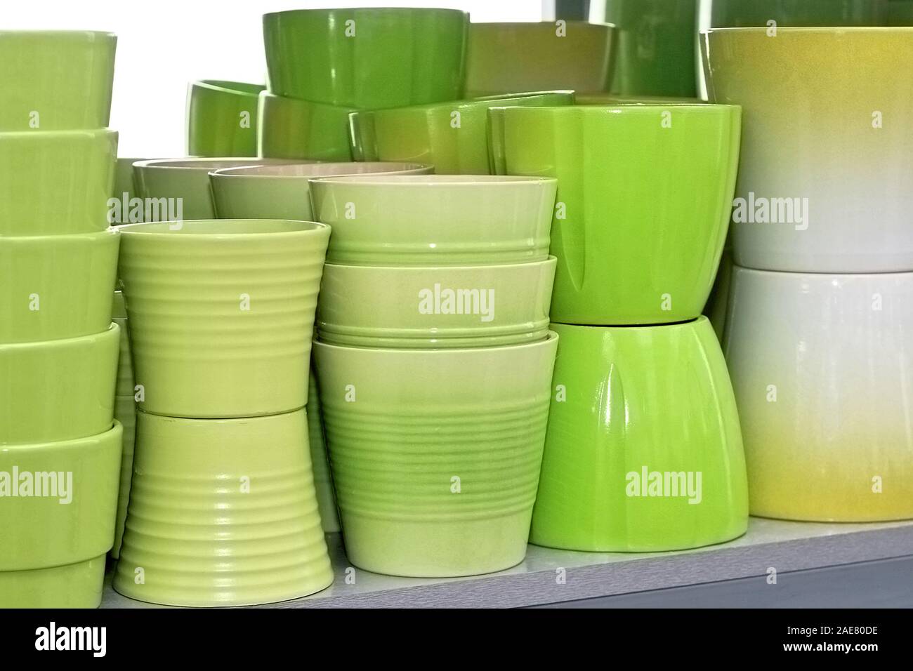 Bunch of various green ceramic pots for flowers Stock Photo - Alamy