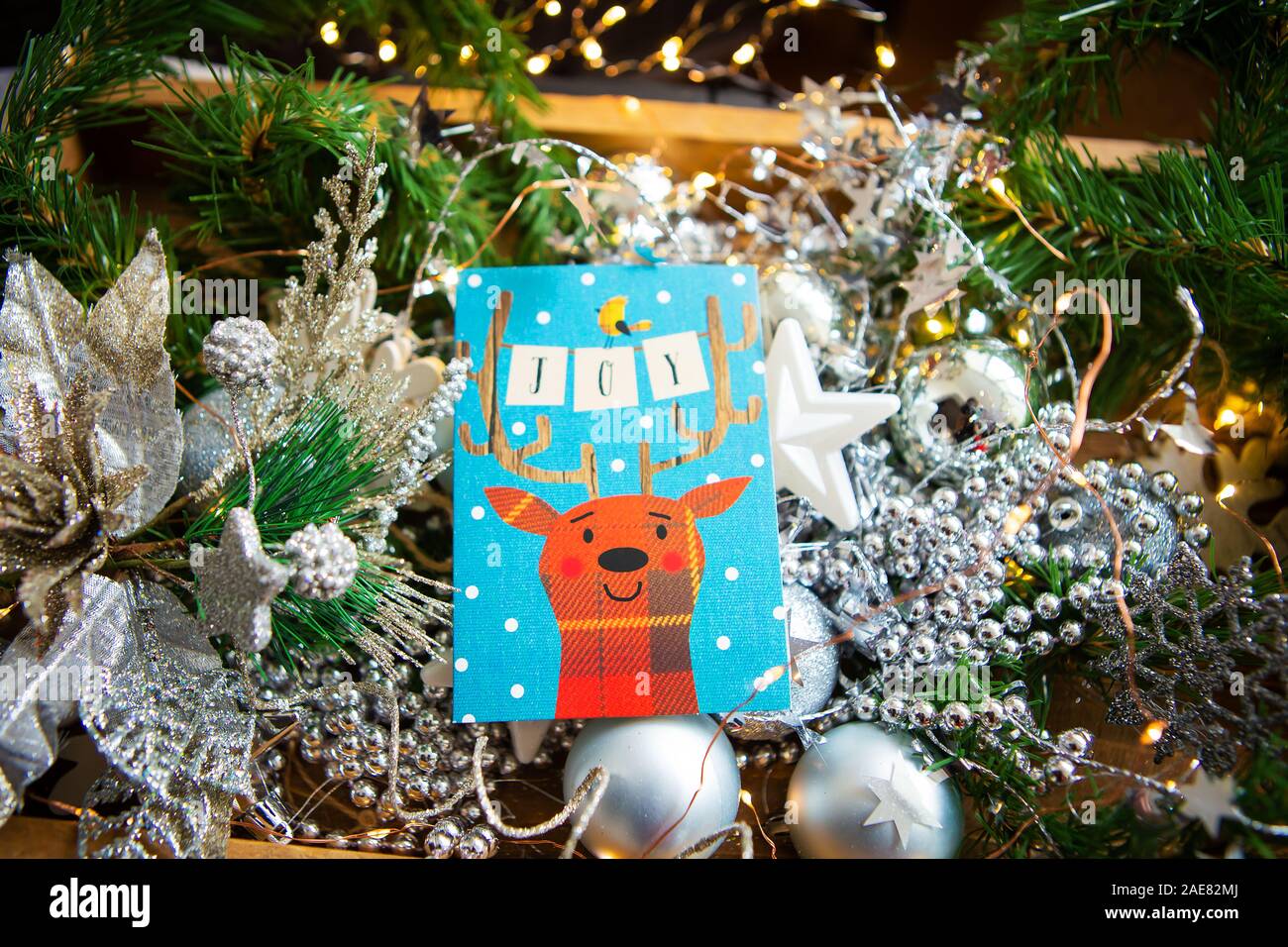 Christmas background. Beautiful card with a deer - joy inscription ...