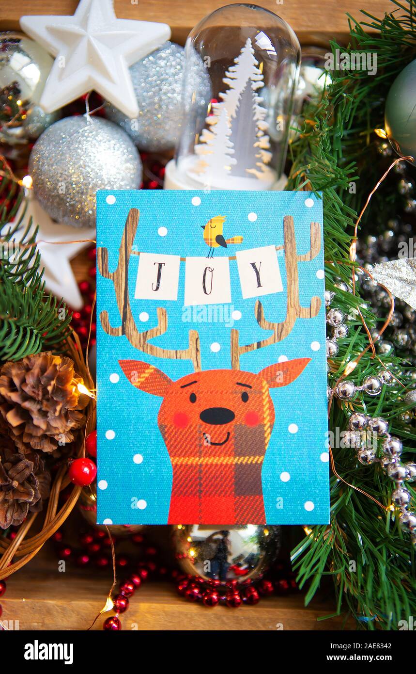Christmas background. Beautiful card with a deer - joy inscription ...