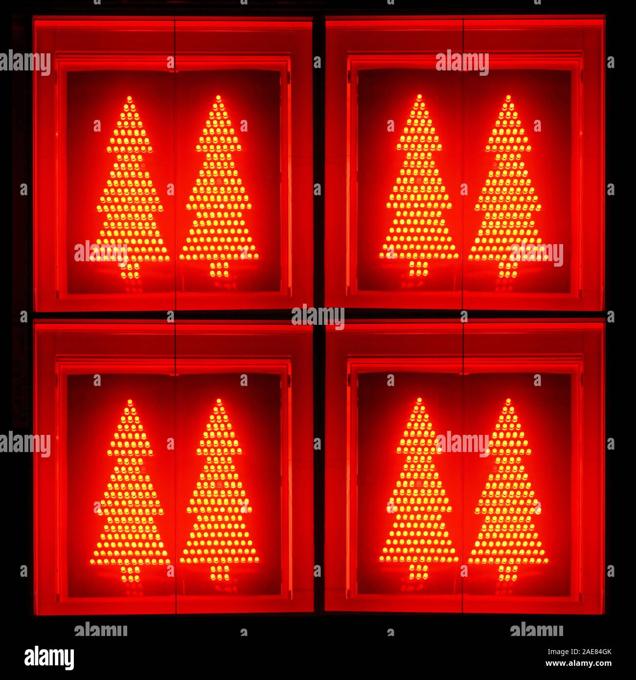 Bright red glow of LED tree sign Stock Photo - Alamy