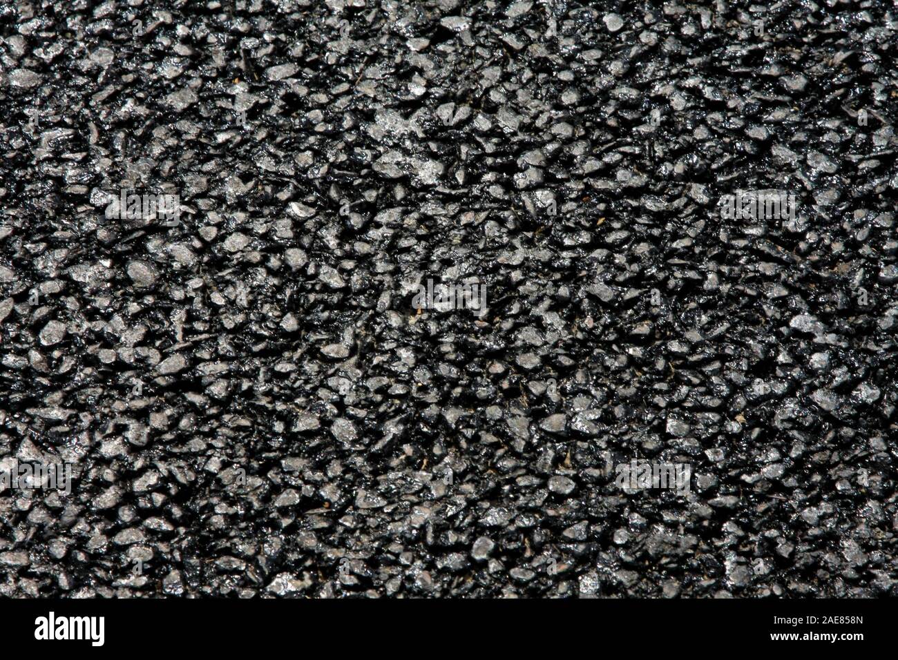 Background texture of road construction material asphalt Stock Photo ...