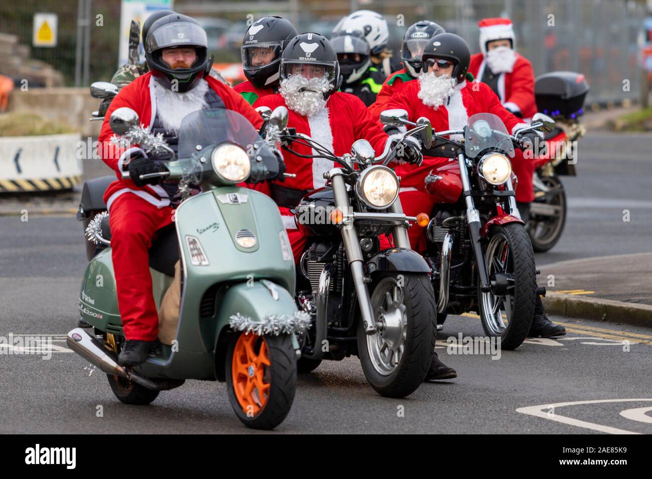 Chelmsford, Essex, UK. 7th Dec 2019. Bikers dressed as Santa visit the ...