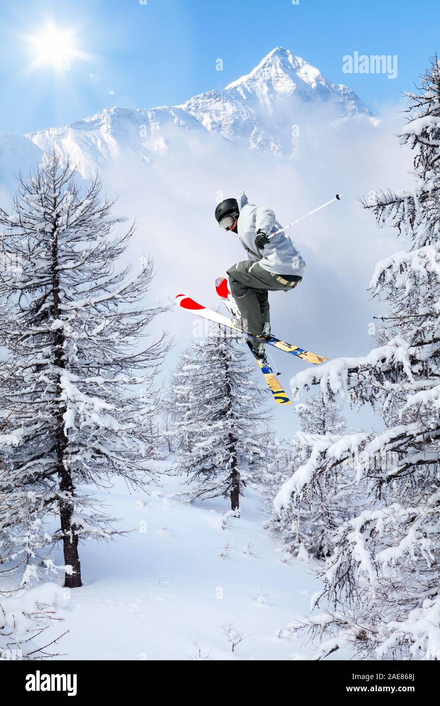 jump with ski in fresh snow Stock Photo - Alamy