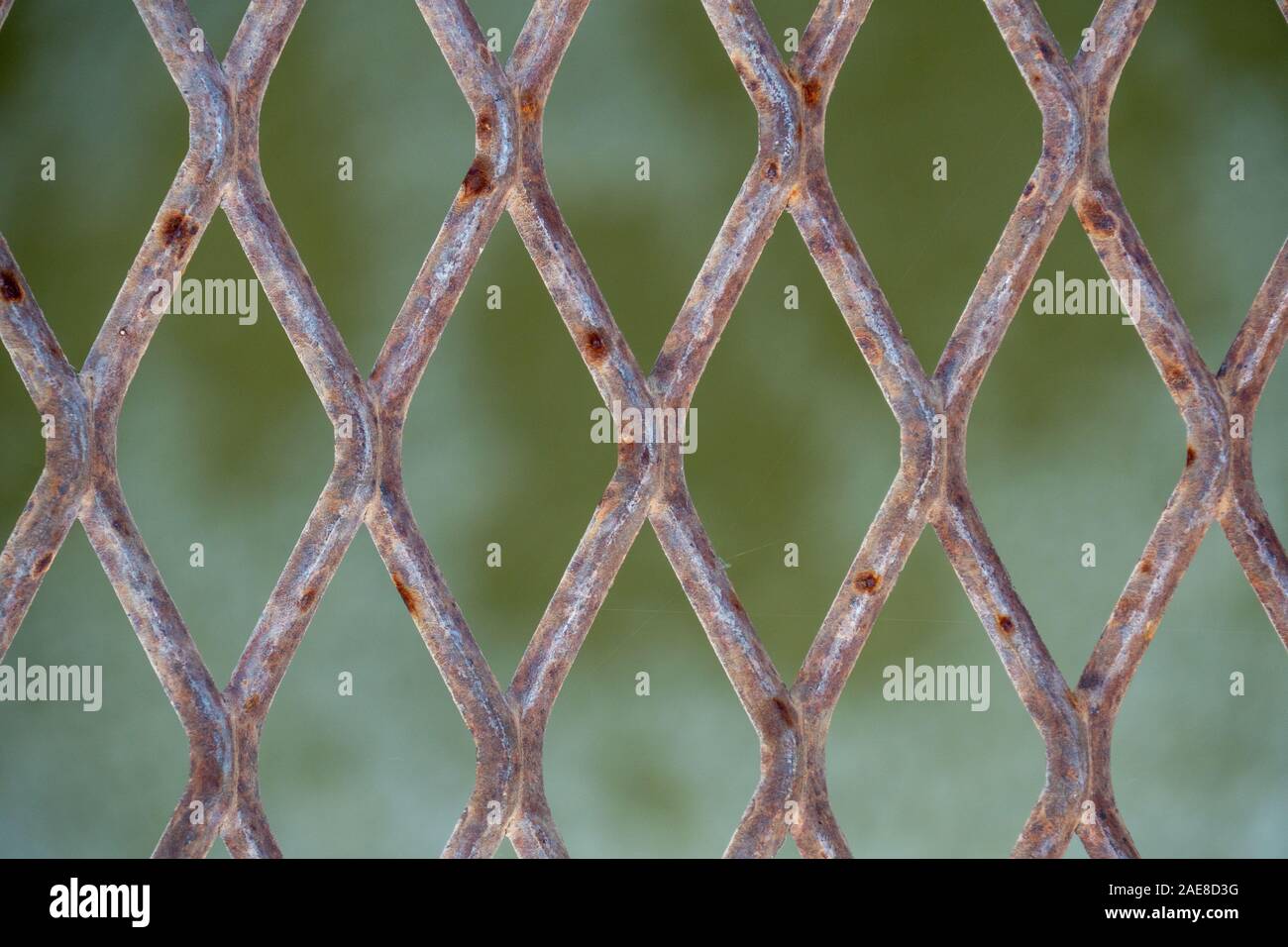 Rusted expanded steel grate metal over water Stock Photo - Alamy