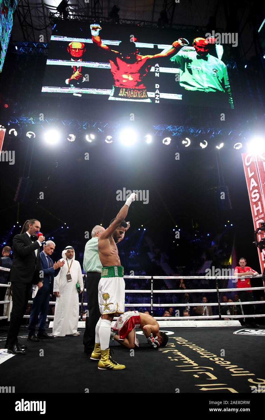 Zuhayr Al Qahtani (nearest) celebrates after his bout with Omar Dusary ...