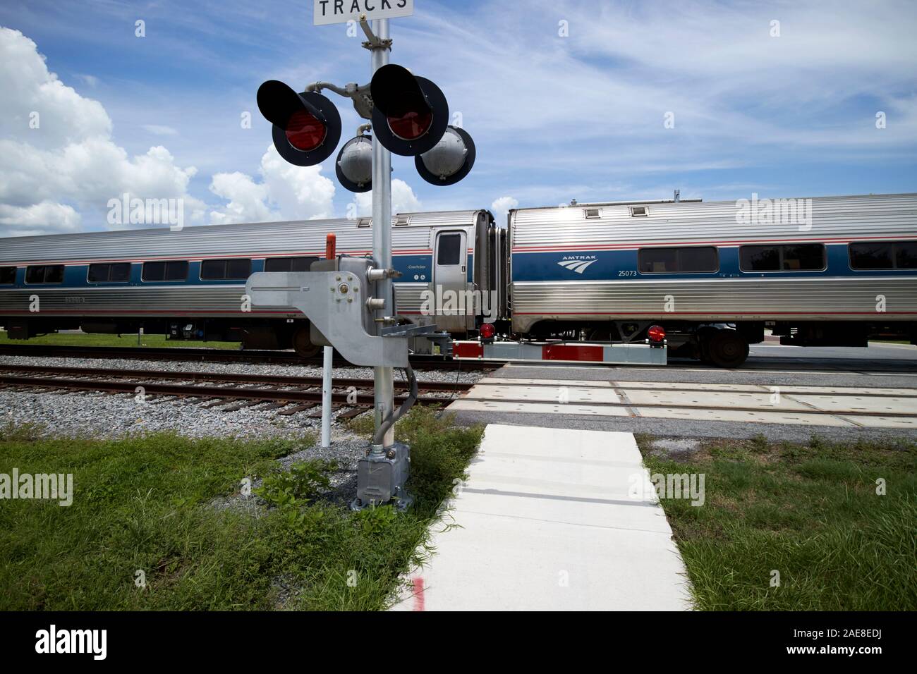 Level crossing train track hi-res stock photography and images - Alamy
