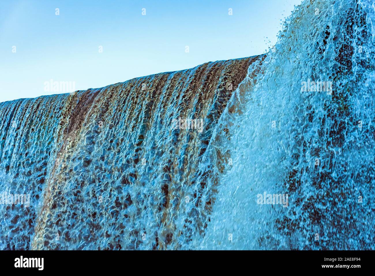 Close-up of a waterfall showing the smooth tumbling water Stock Photo ...