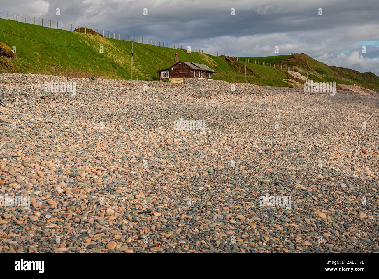 Nethertown, Cumbria, England, UK - May 02, 2019: The pebble beach and a ...