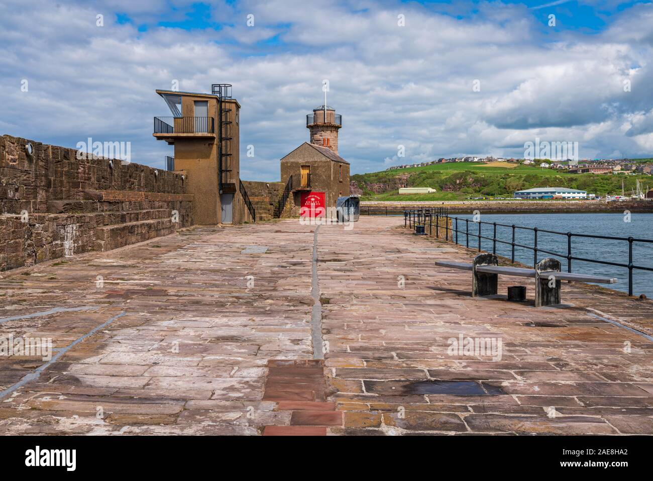 Whitehaven, Cumbria, England, UK - May 03, 2019: Wall and buildings on ...