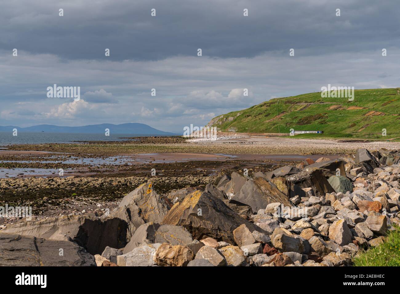 Parton, Cumbria, England, UK - May 03, 2019: A train passing Parton Bay ...