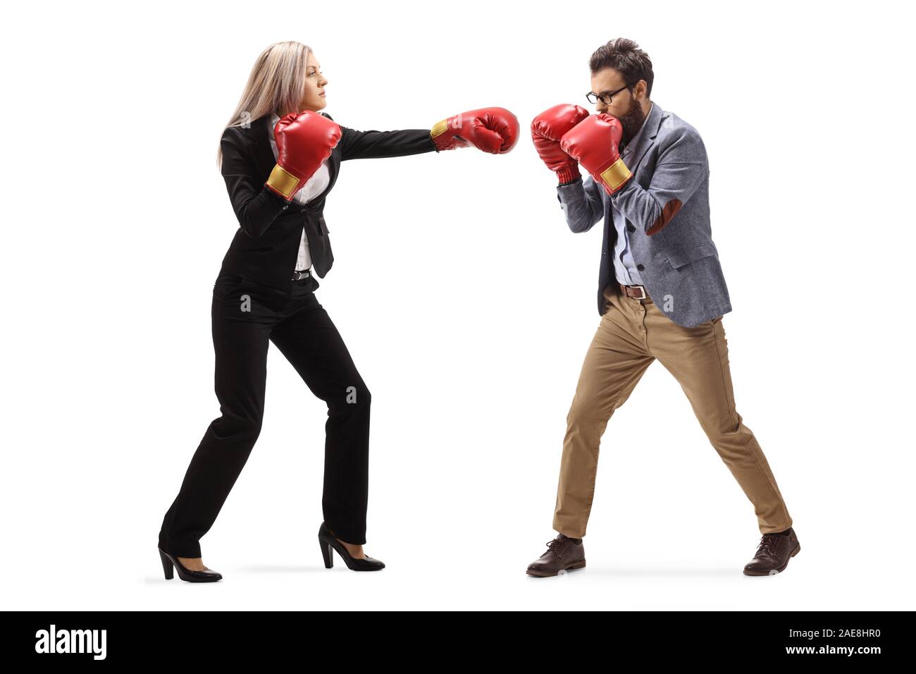 Full length profile shot of a man and woman in formal clothes fighting ...