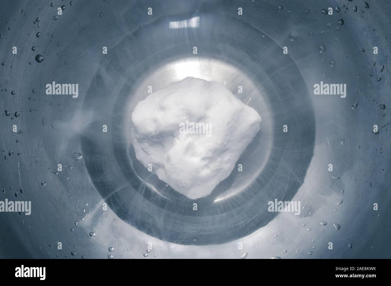 Sublimating dry ice - solid carbon dioxide Stock Photo - Alamy