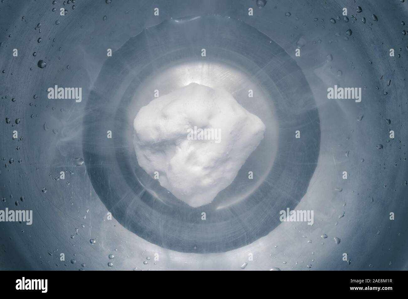 Sublimating dry ice - solid carbon dioxide Stock Photo - Alamy