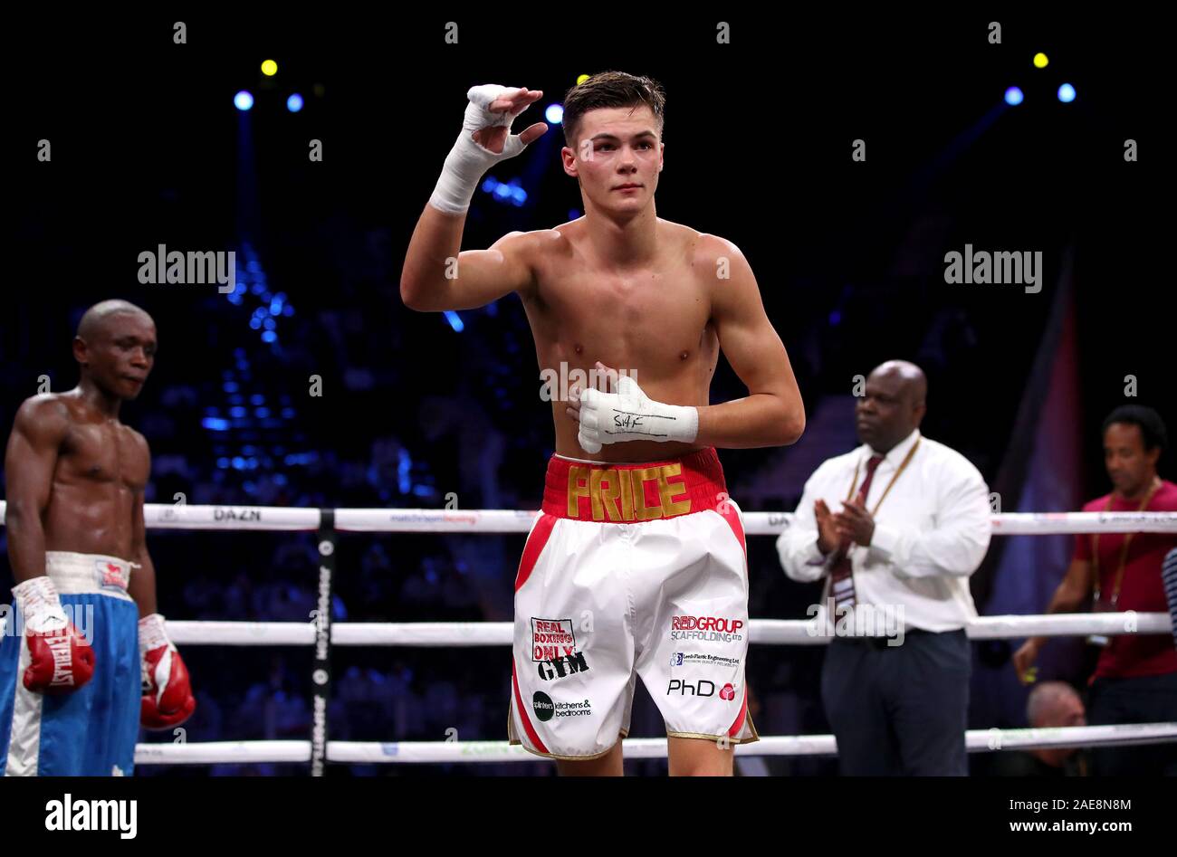 Hopey Price celebrates beating Swedi Mohamed (not pictured) in their ...