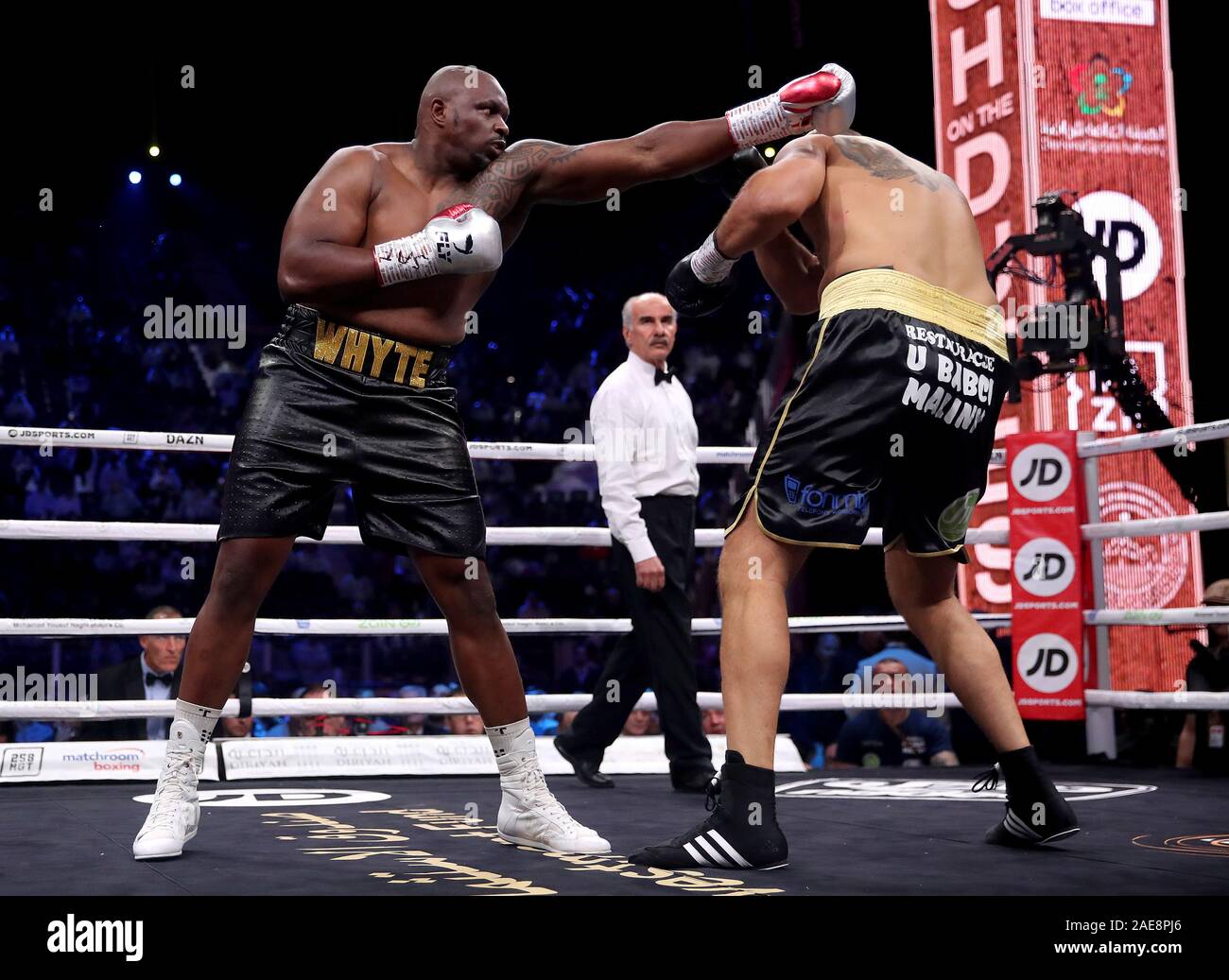 Dillian Whyte (left) in action against Mariusz Wach in their ...