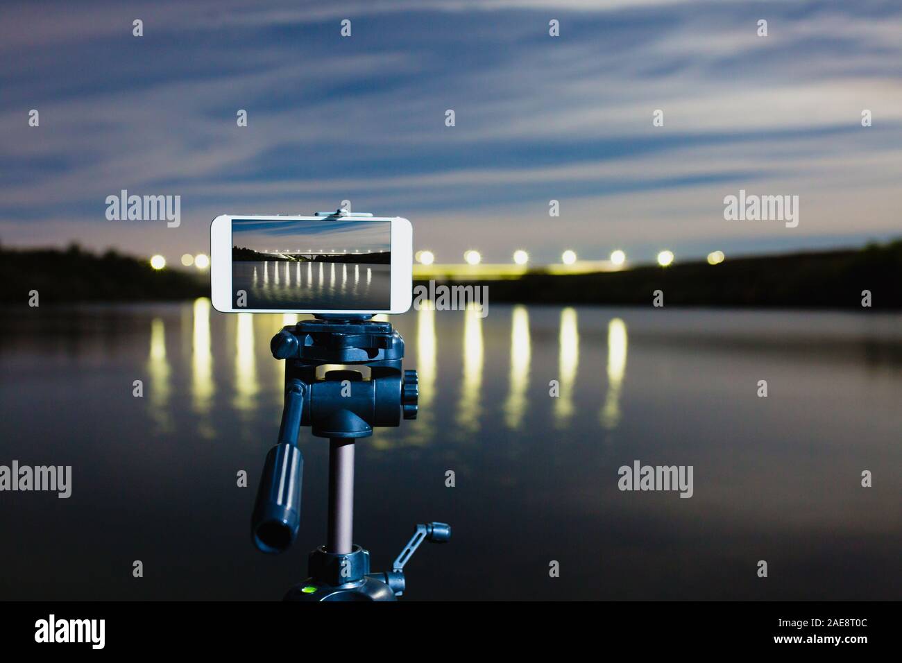 Using smartphone like professional camera on tripod to capturing night ...