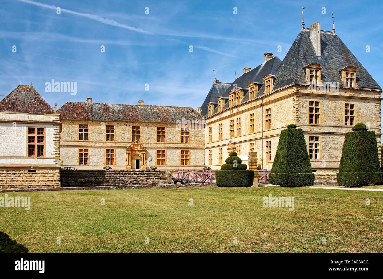 Chateau Courmatin; 17th century castle; small wood bridge, topiaries ...