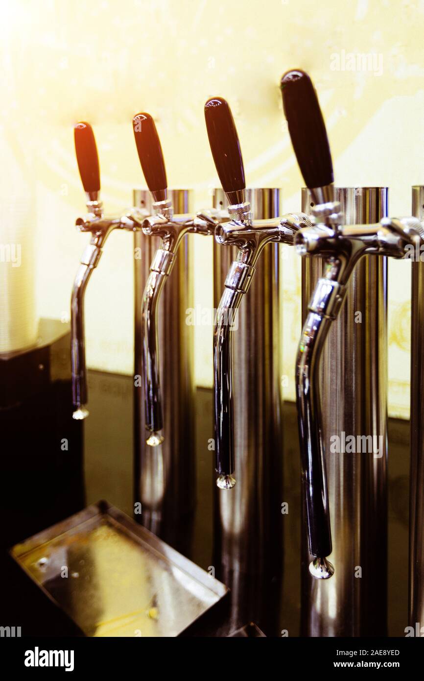 Silver beer taps hi-res stock photography and images - Alamy