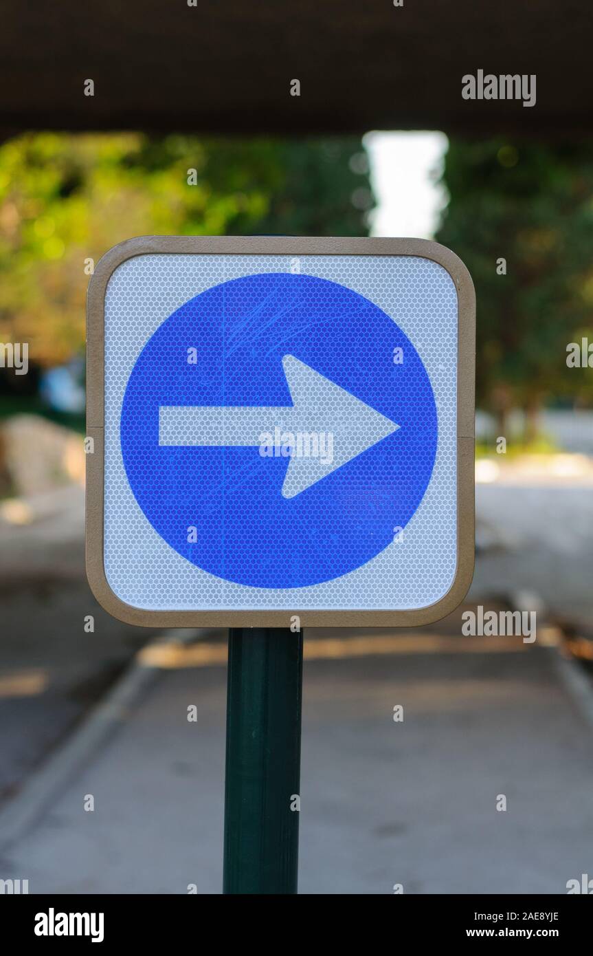 Traffic sign: mandatory sense turn to the right Stock Photo - Alamy