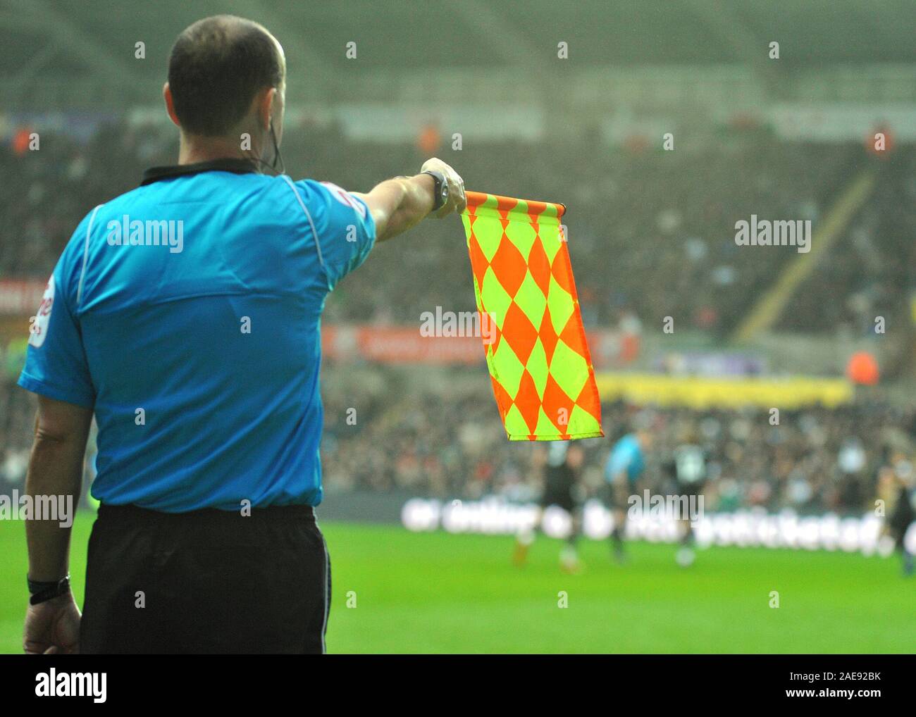 The referees assistant flags for offside hi-res stock photography and ...