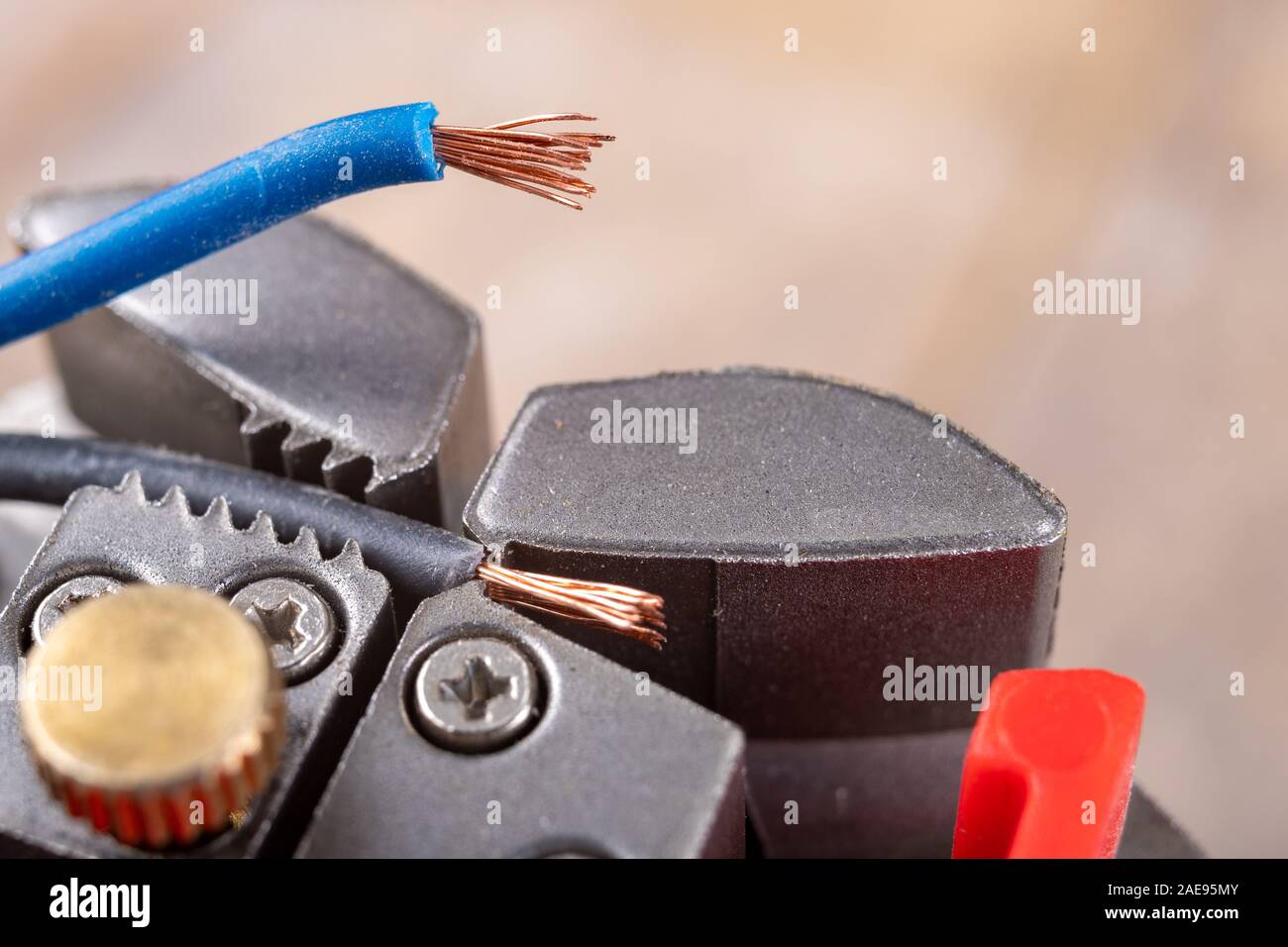 Electrical wire stripper. Electrical accessories used in industry. Dark ...
