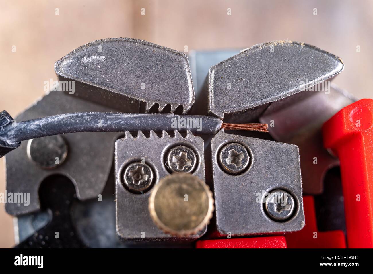 Electrical wire stripper. Electrical accessories used in industry. Dark ...