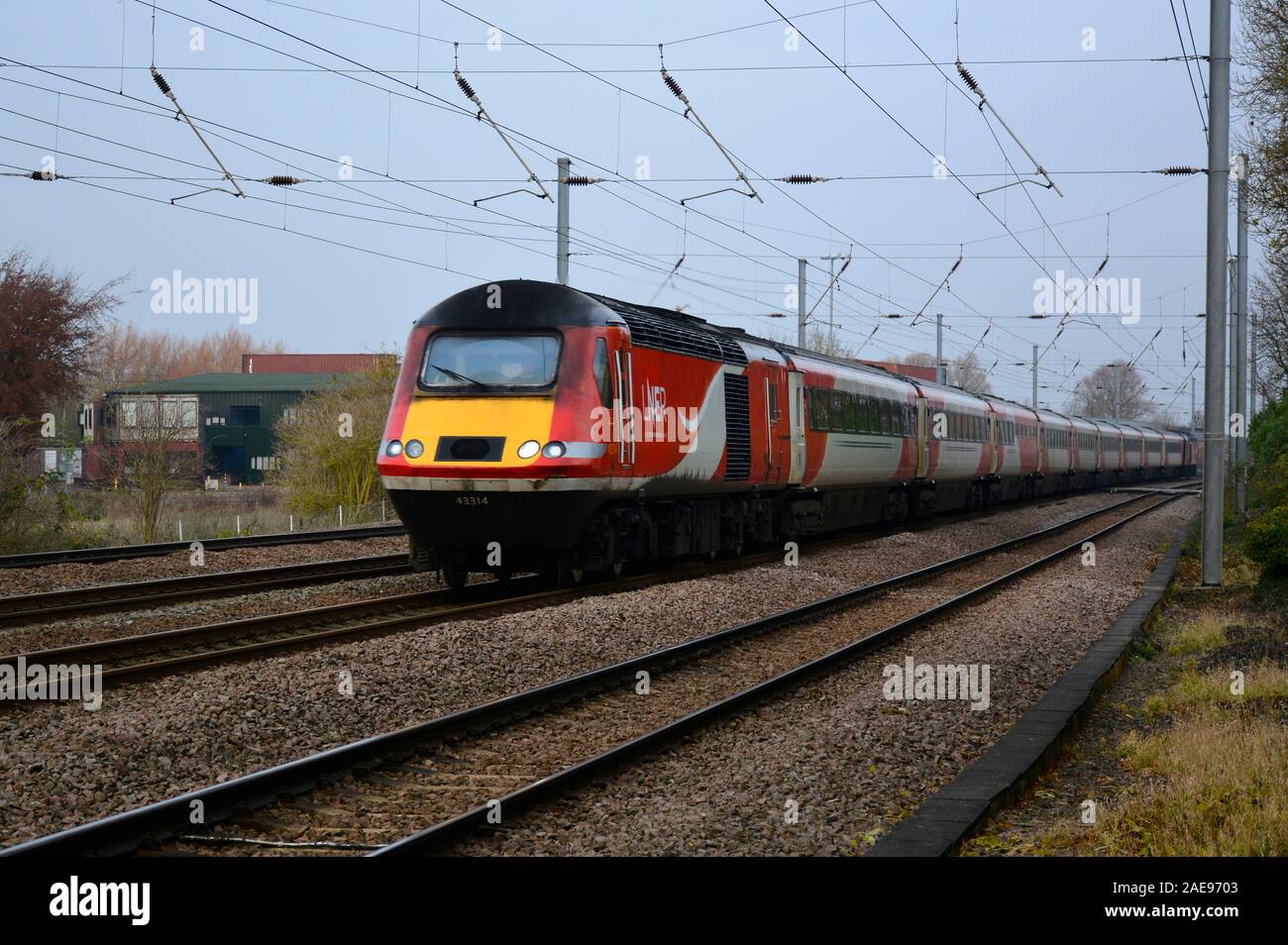 LNER Class 43 HST 43314 passes Offord Cluny on the East Coast Main Line, Cambridgeshire UK Stock ...