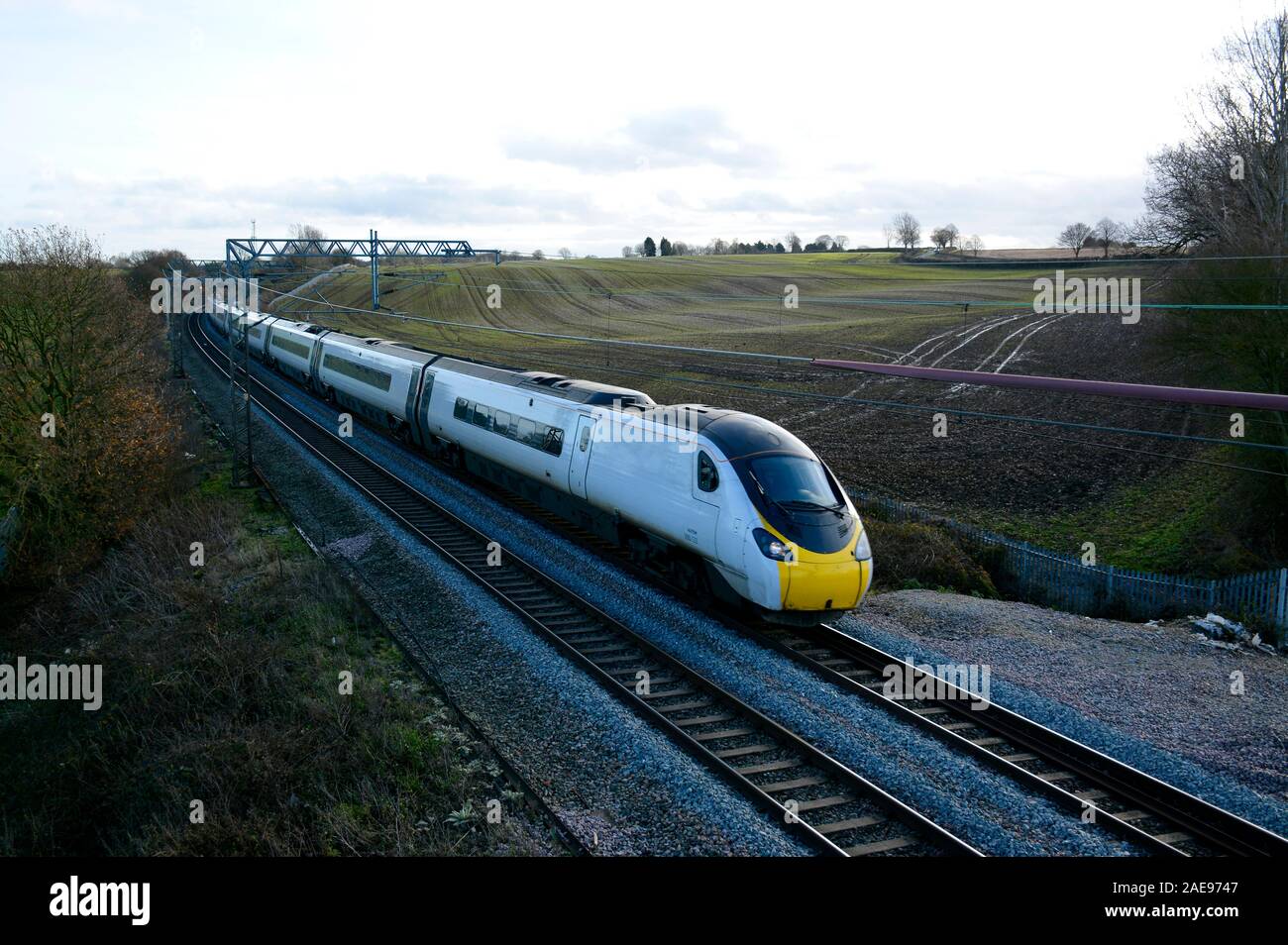 A Virgin Trains Class 390 Pendolino 390112 powers up the West Coast ...