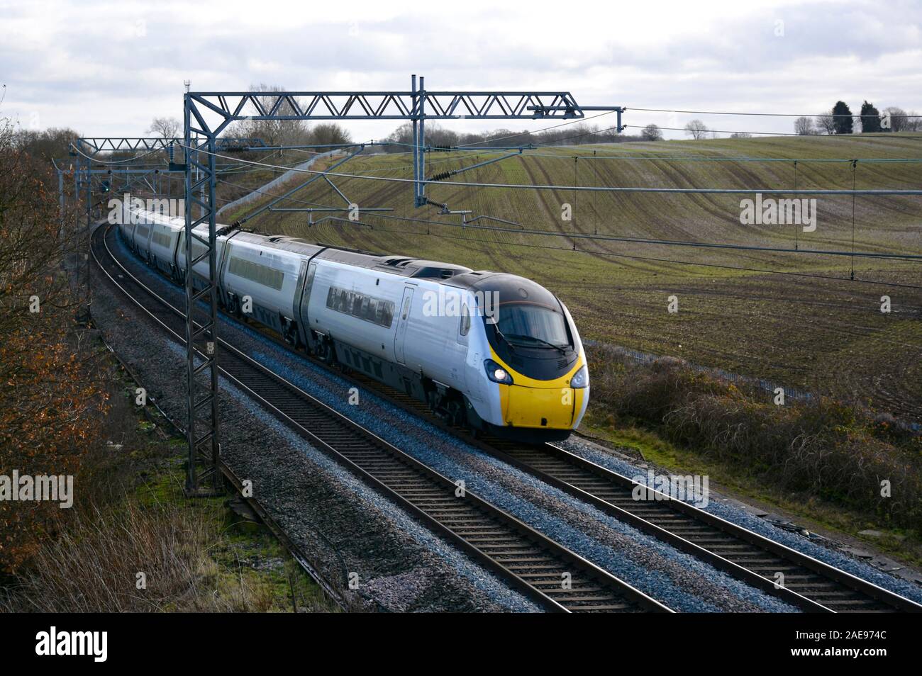 A Virgin Trains Class 390 Pendolino 390118 powers up the West Coast ...