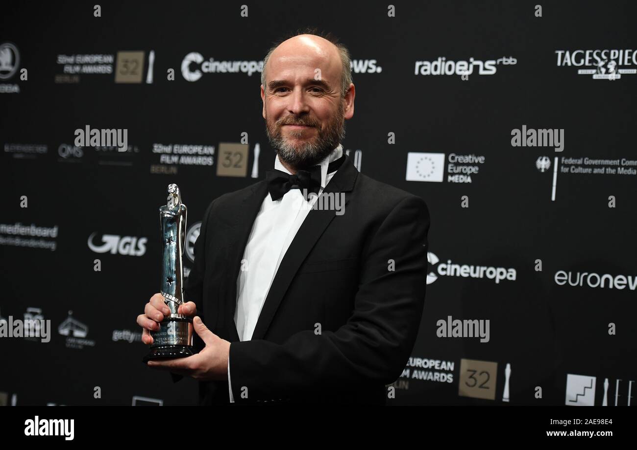 Berlin, Germany. 07th Dec, 2019. Director Jeremy Clapin holds the prize ...