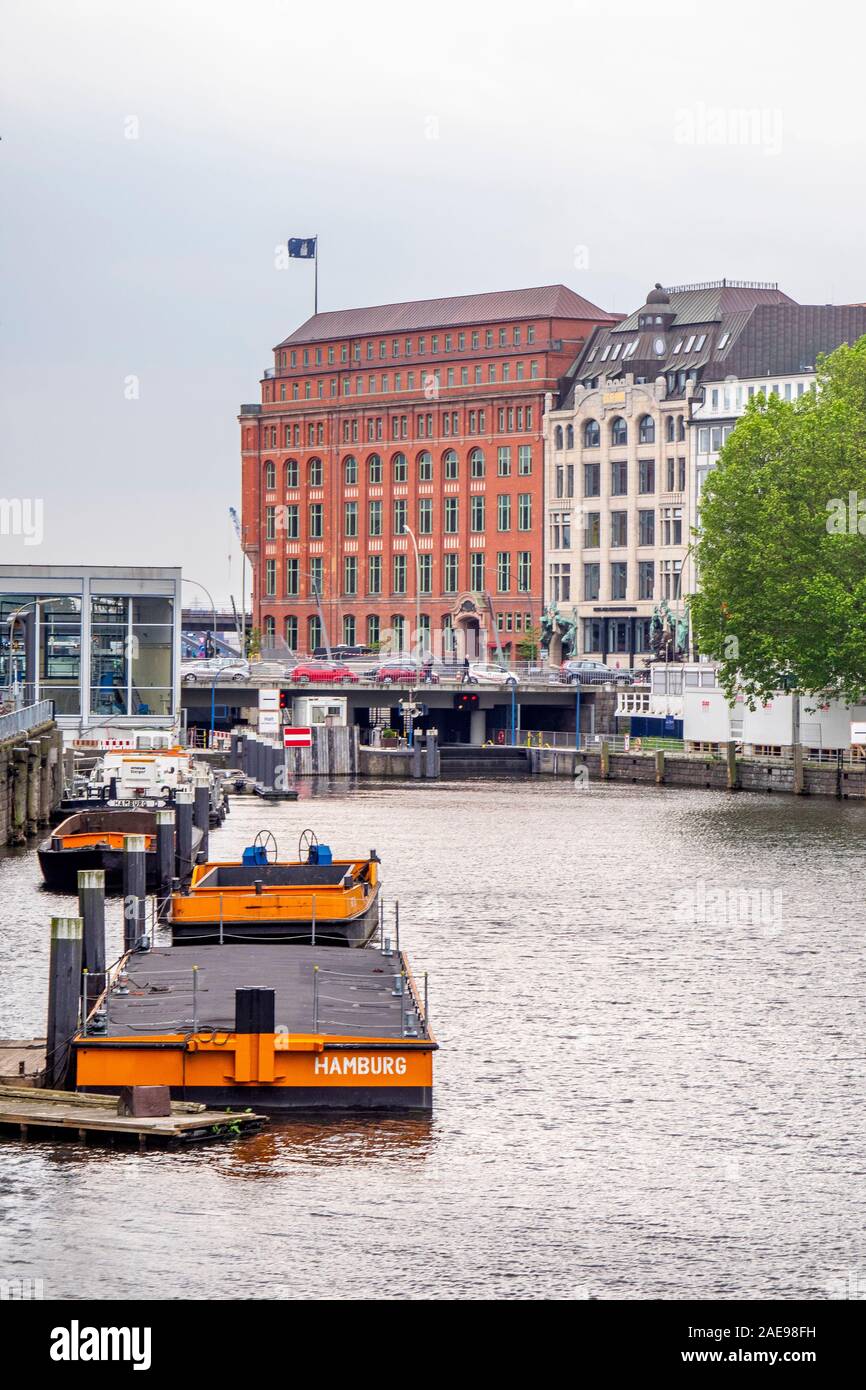 Office buildings and barge and pontoon on canal in Hamburg Germany ...