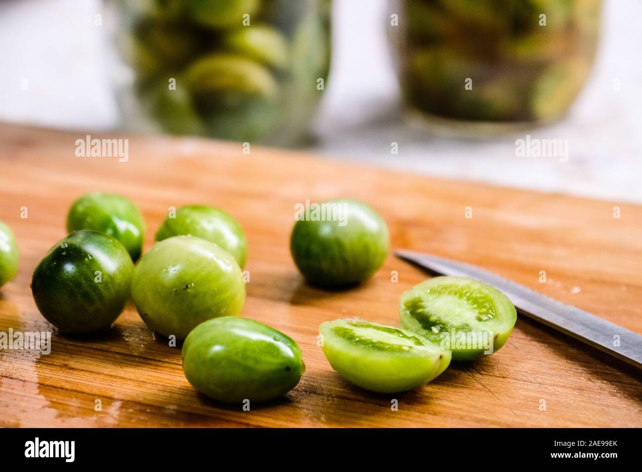 Fresh organic green cherry tomatoes Stock Photo - Alamy