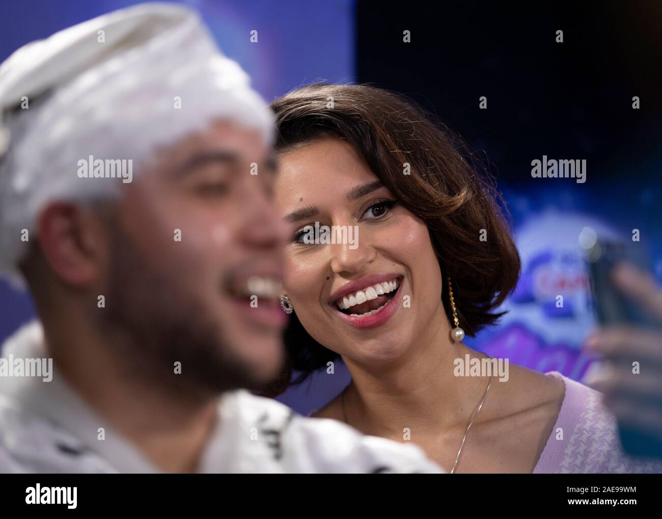 Raye looks on at Jax Jones during a video call backstage in the on air ...