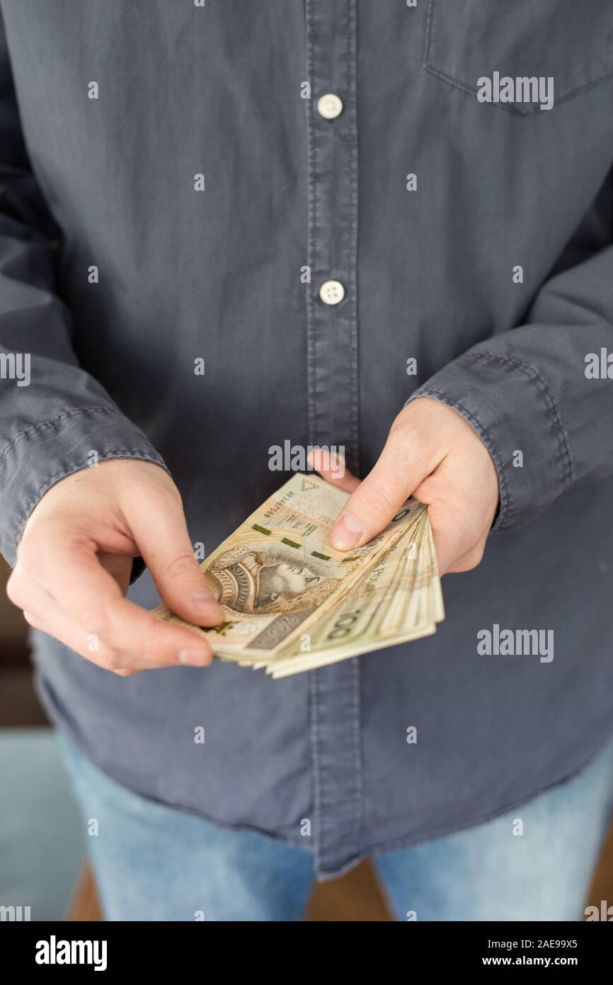Business man counting money hi-res stock photography and images - Alamy