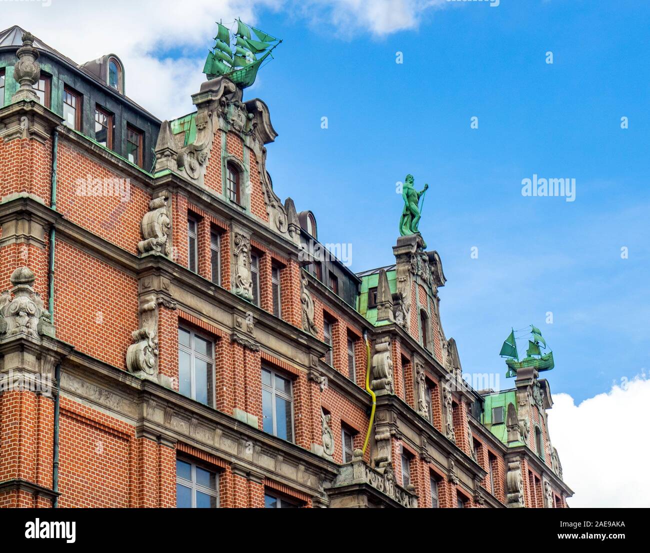 Statue and sculptures of sailing ships on the top of gables of ...