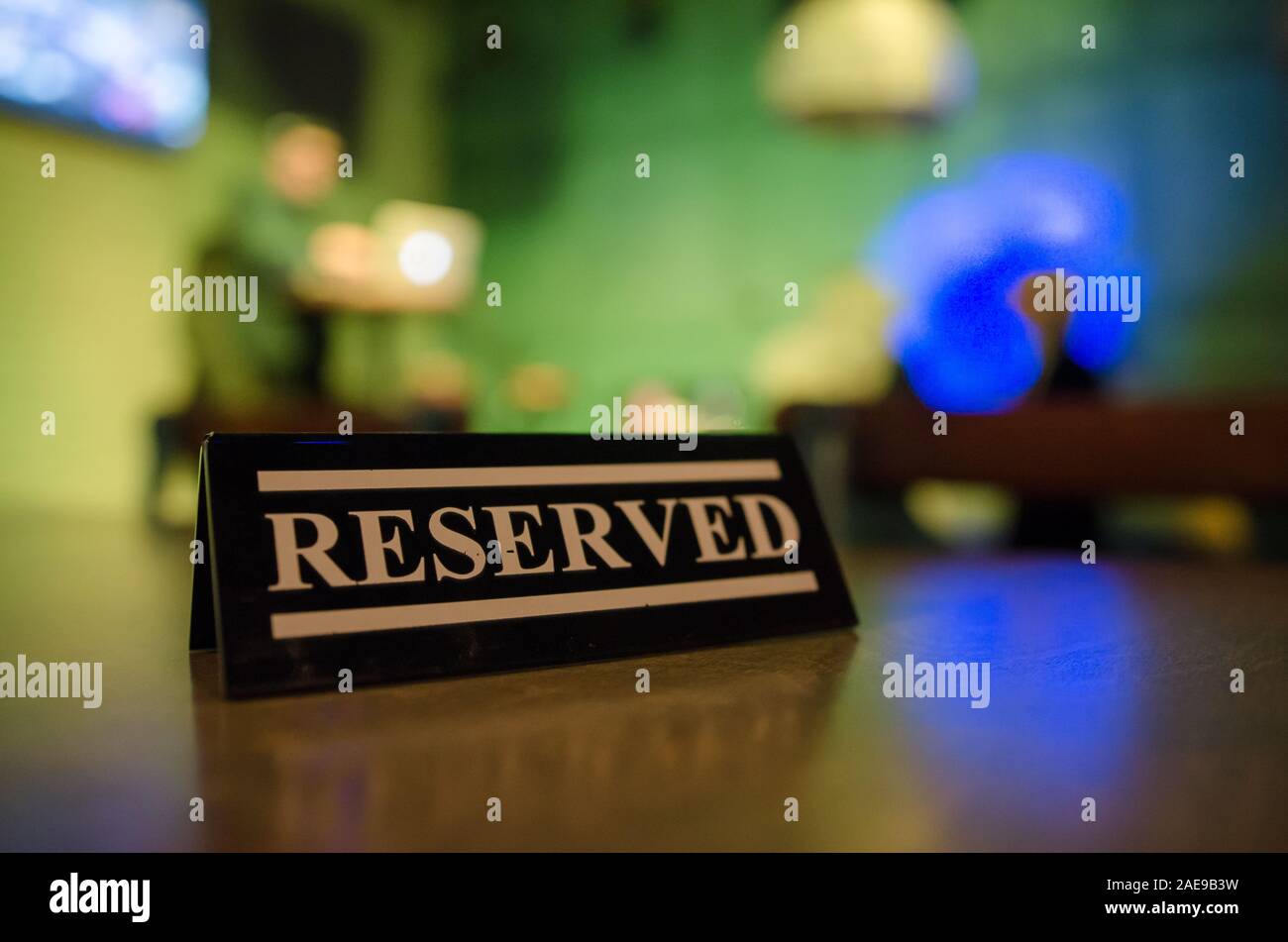 Reserved sign on wooden table hi-res stock photography and images - Alamy
